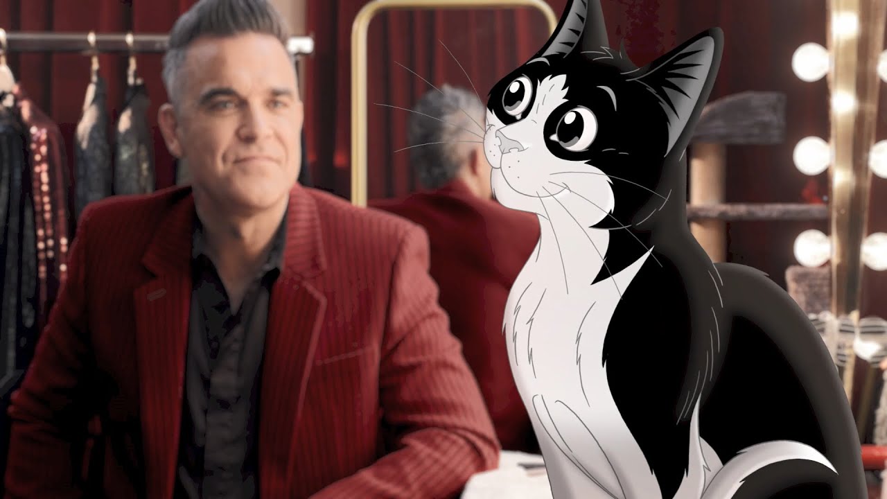 Felix and Robbie Williams behind the scenes